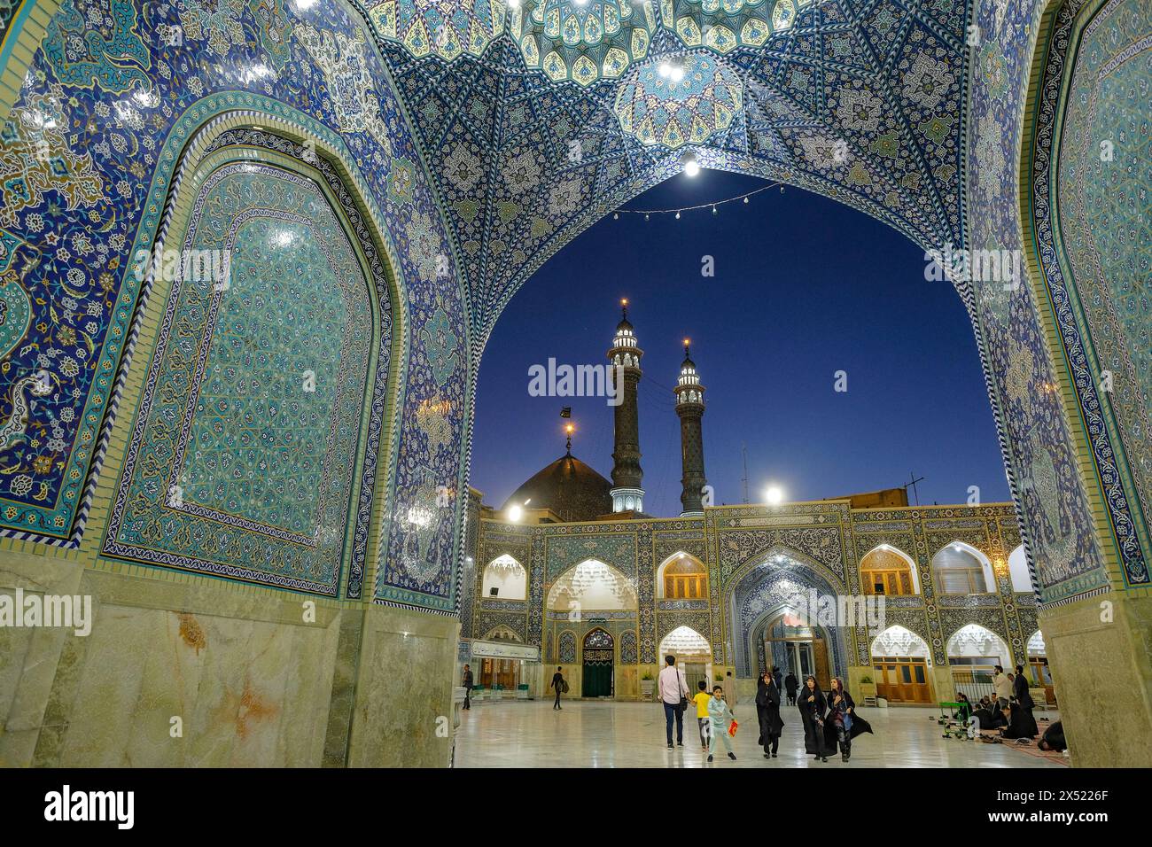 Qom, Iran - April 6, 2024: People visiting the Fatima Masumeh Shrine in Qom, Iran. Fatima ...