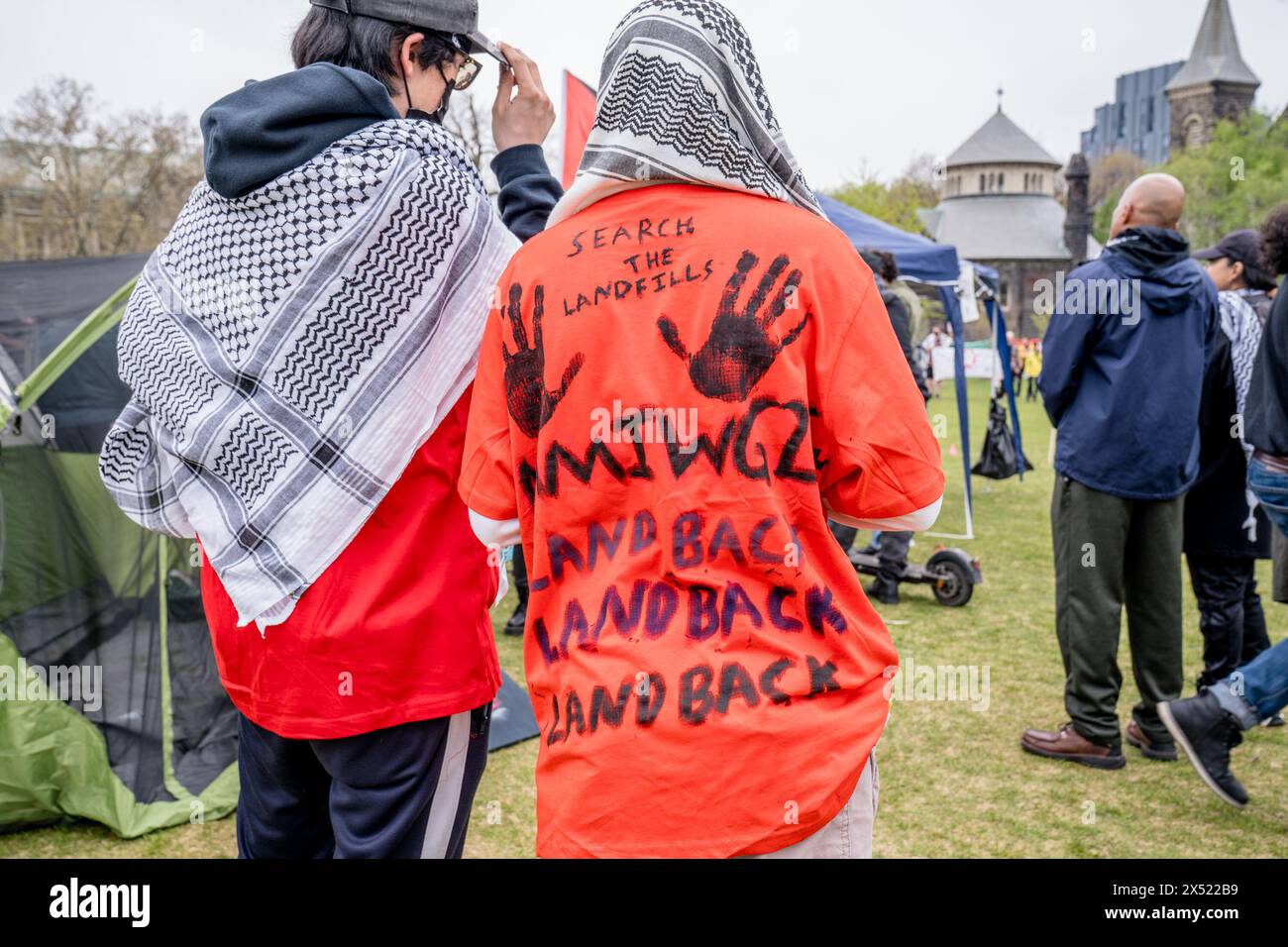 Pro-Palestinian activist wears shirt on behalf of Red Dress Day, the ...