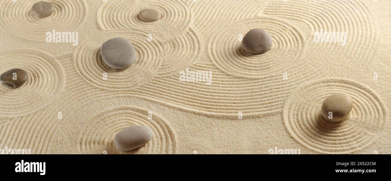 Zen garden with the sand pattern and the stones Stock Photo - Alamy