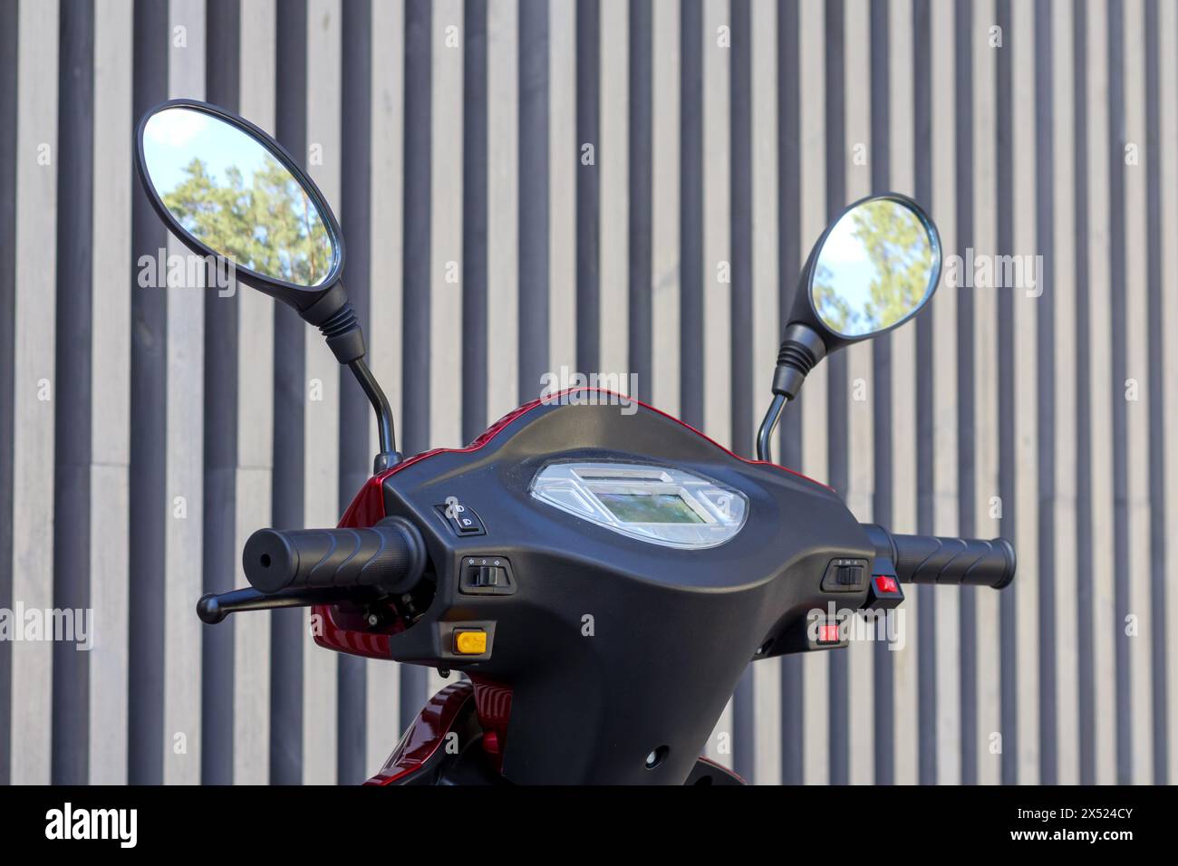 electric scooter in red color with rear view mirrors Stock Photo - Alamy