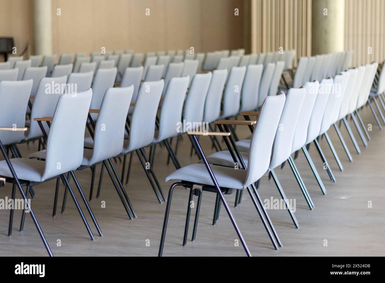 conference hall with row upon row of chairs Stock Photo - Alamy