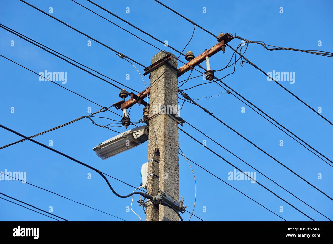 Electric line post Stock Photo - Alamy