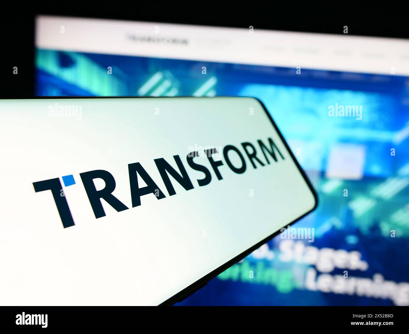 Mobile phone with logo of German technology event TRANSFORM (Bitkom e.V ...