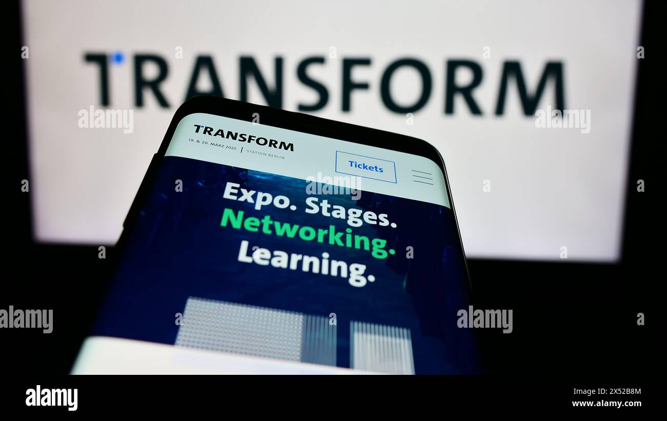 Smartphone with website of German technology event TRANSFORM (Bitkom e ...