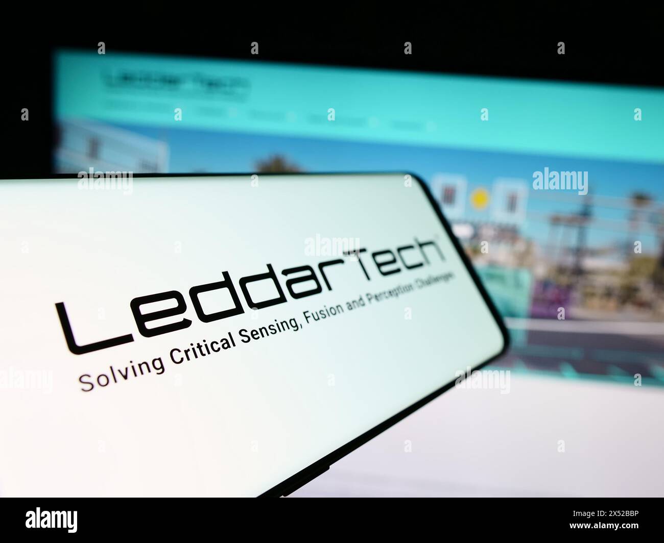 Smartphone with logo of Canadian lidar company LeddarTech Holdings Inc ...