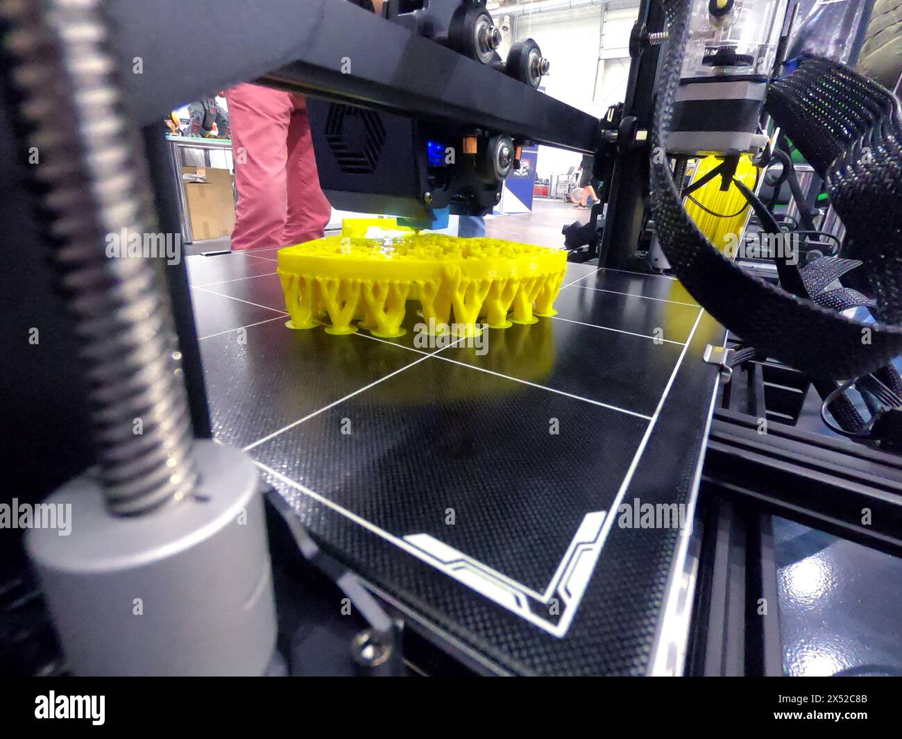 Abstract object printing on 3D printer with molten plastic close-up. 3D ...