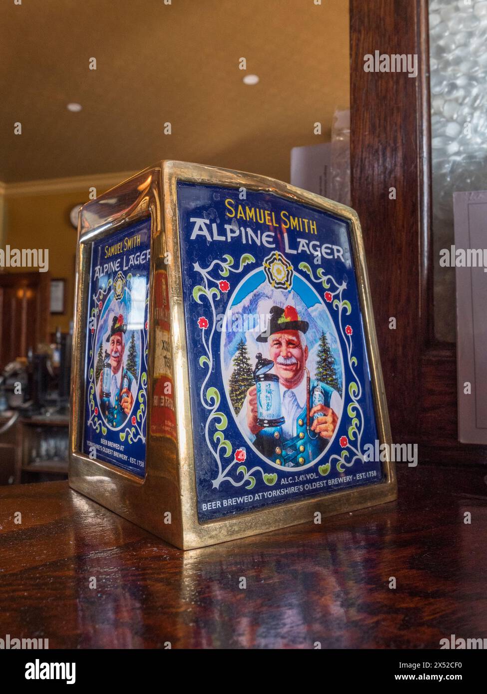 Pump head for Alpine Lager by Samuel Smith on the bar in The Angel ...