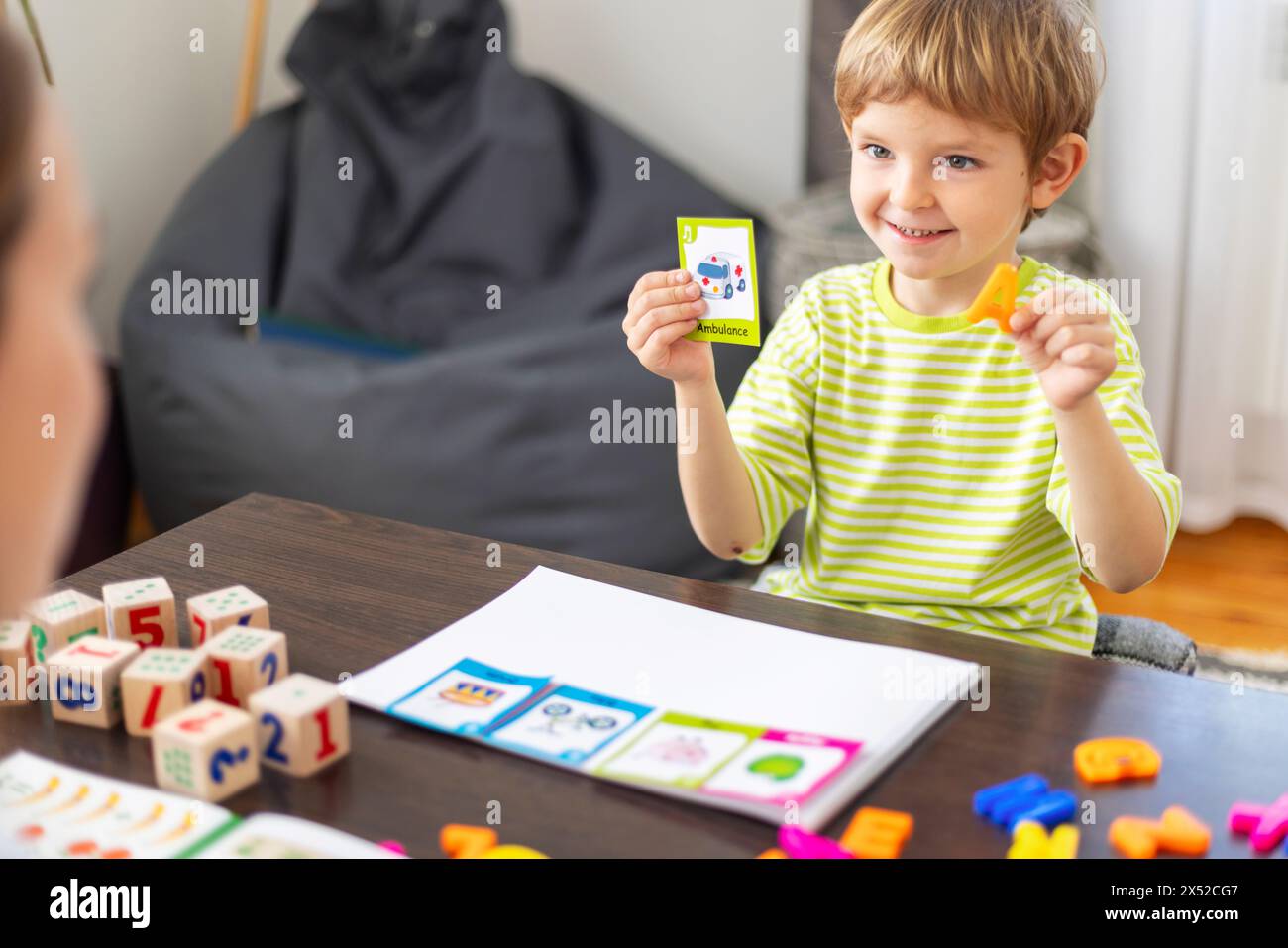 Boy Playing Educational Games for Learning Concept Stock Photo - Alamy