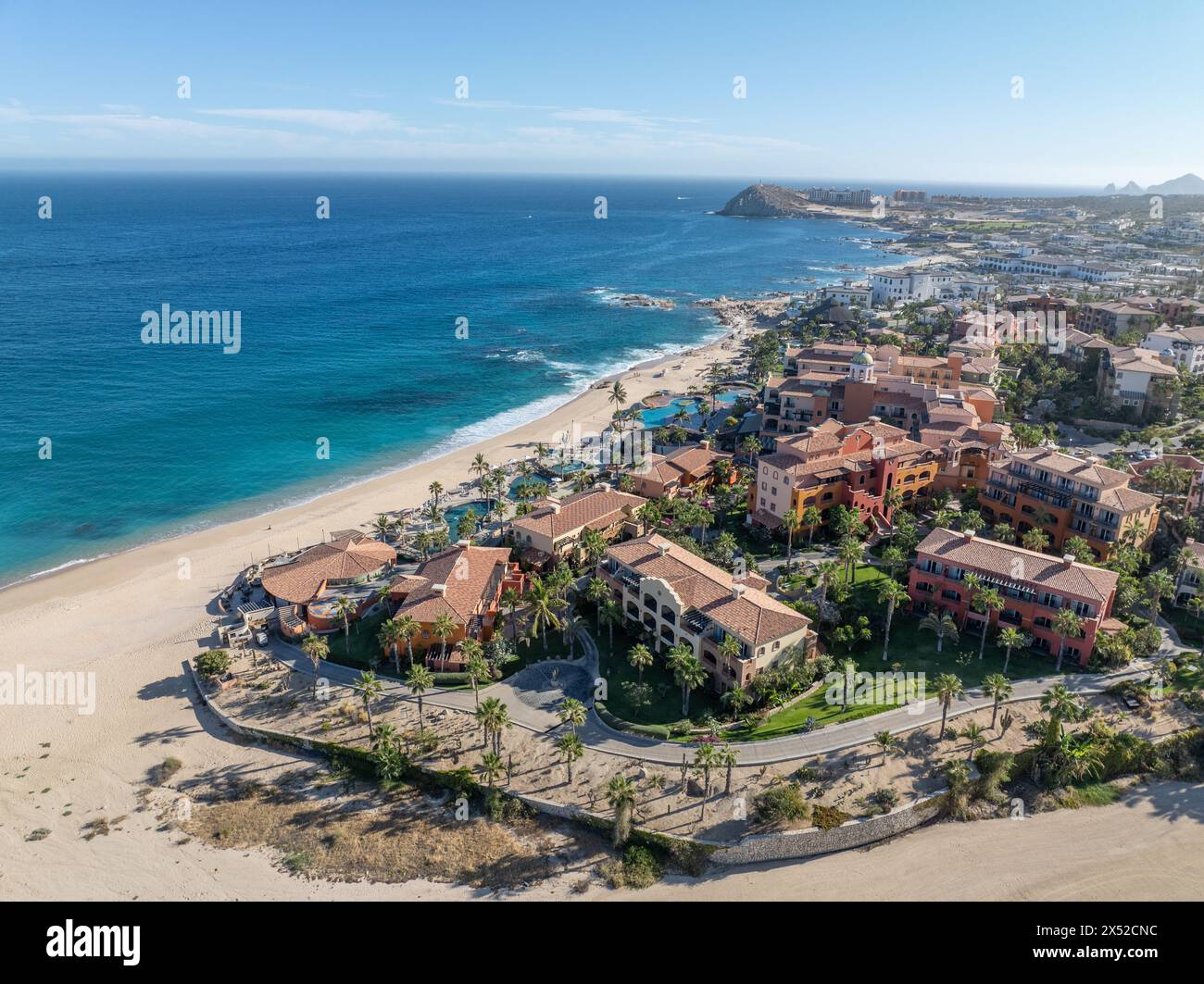 Aerial view of tropical beach with resorts in Cabo San Jose, Baja ...