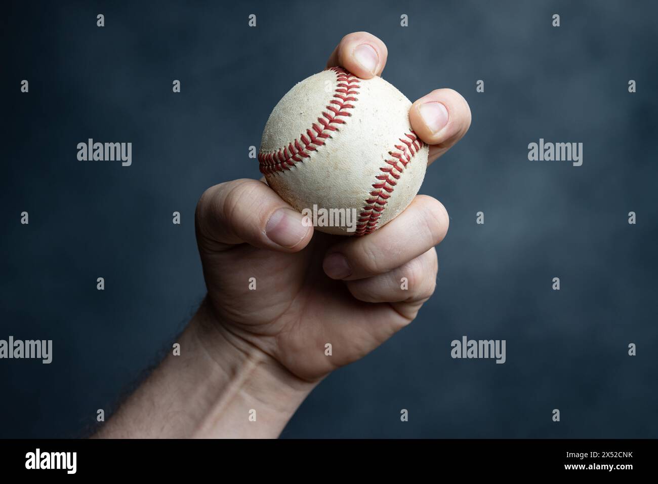 Fastball grip variation; baseball in hand Stock Photo - Alamy