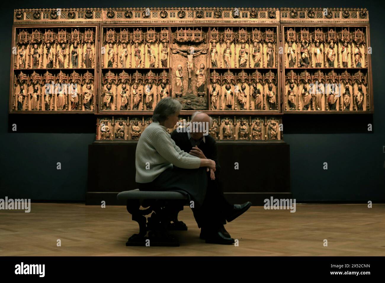 Two visitors explore the rich history and symbolism of a medieval ...