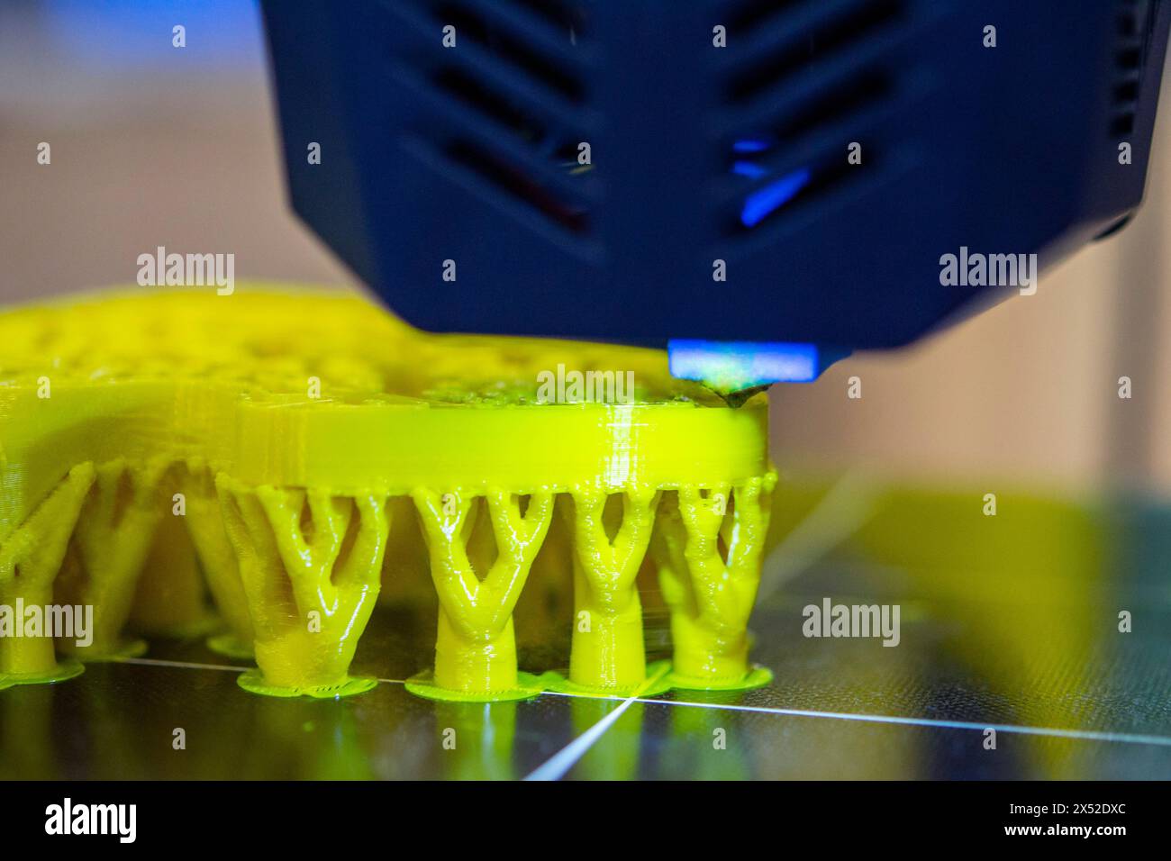 3D printer printing object close-up. Process creating three-dimensional model on 3d printer ...