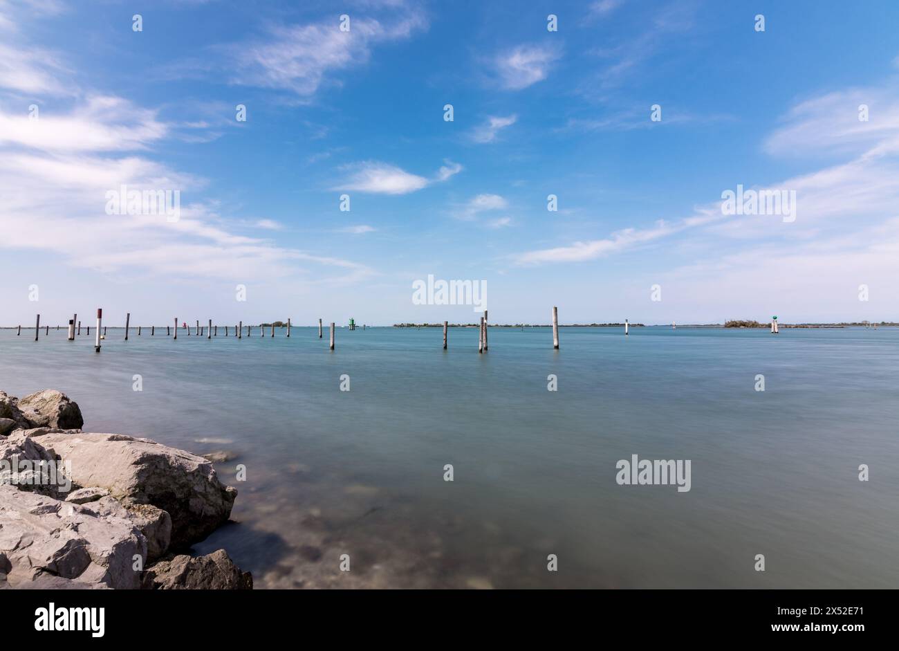 Panorama of the sky and sea in Grado, Italy with long exposure sunny ...