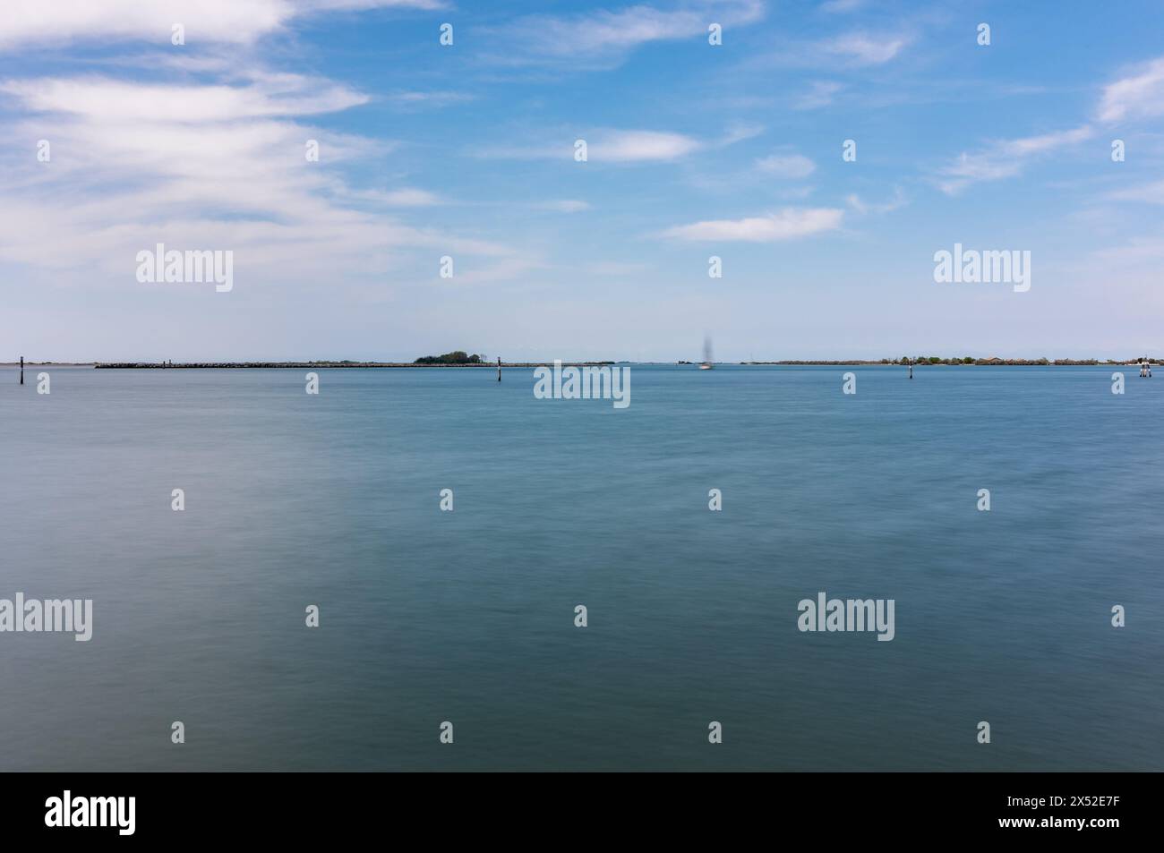 Panorama of the sky and sea in Grado, Italy with long exposure sunny ...