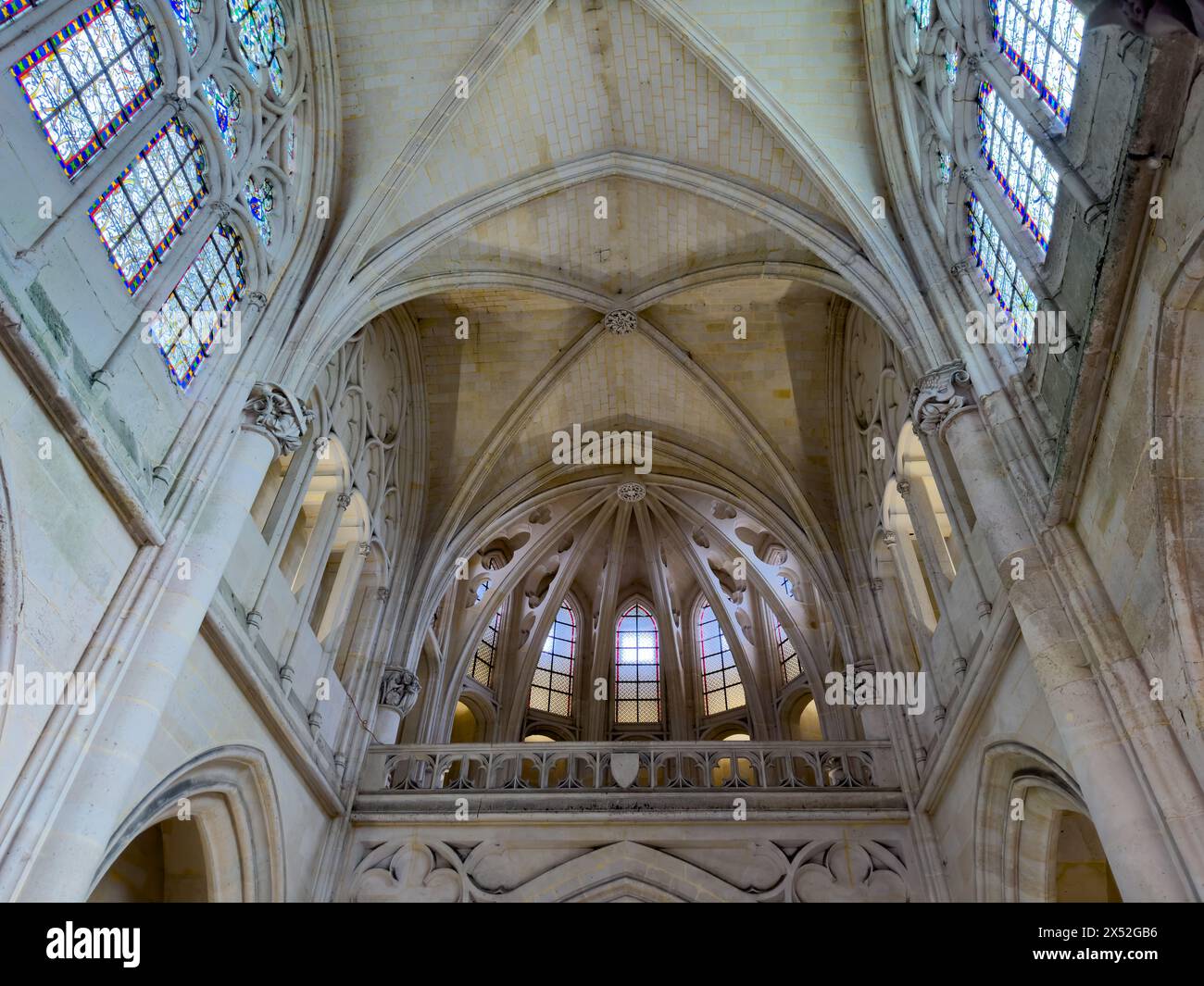 Gothic architecture with vaulted ceilings and stained glass Stock Photo ...