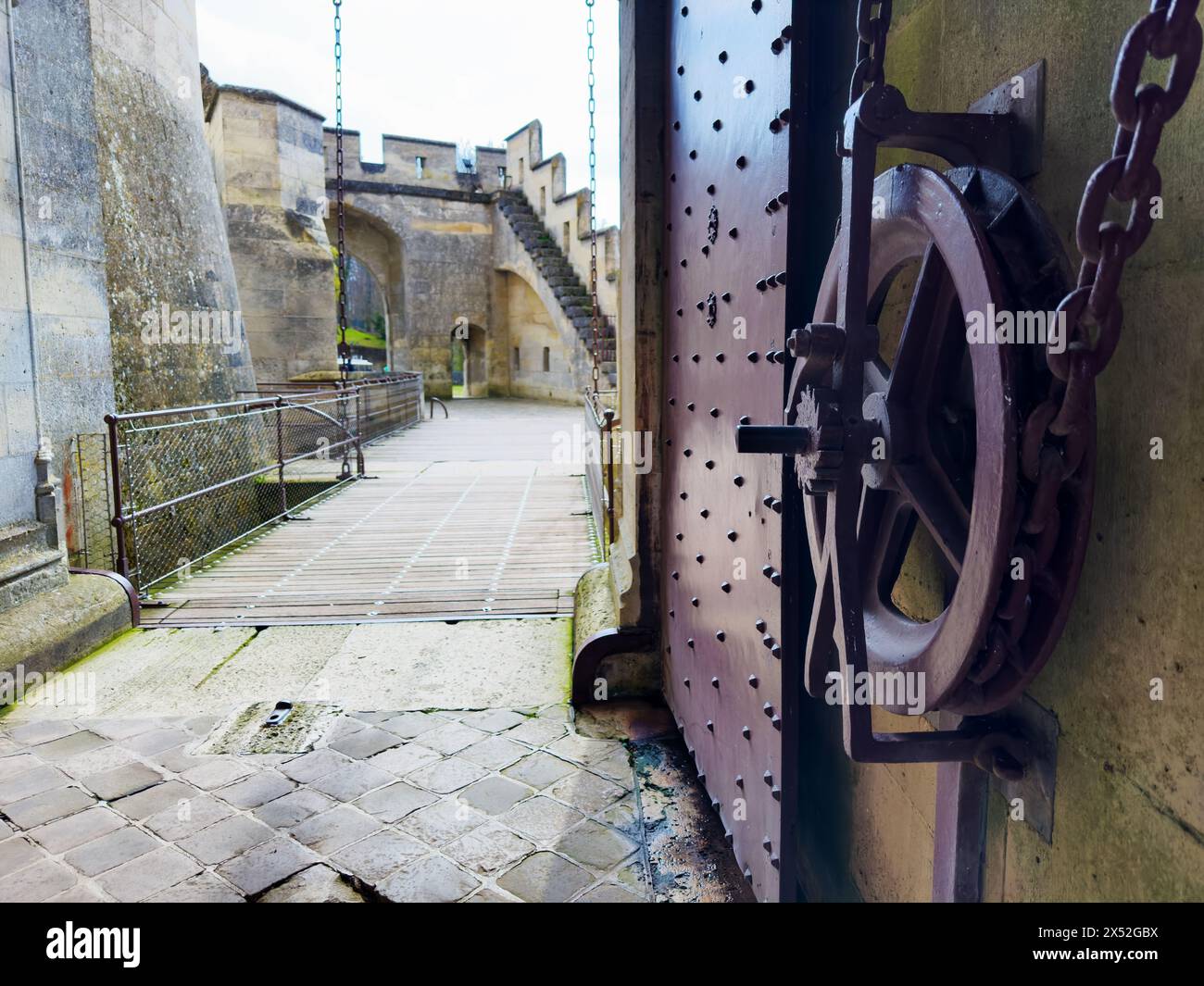 Old castle gate with drawbridge mechanics in medieval fortress Stock ...
