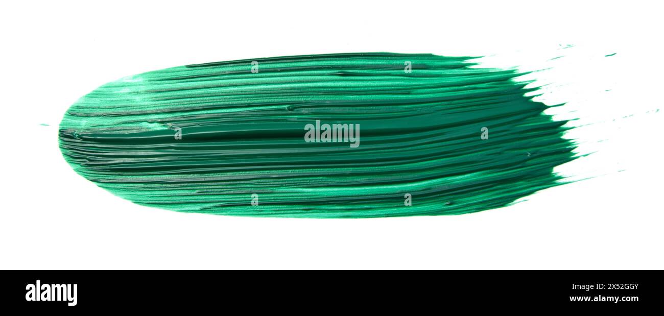 Vibrant green acrylic paint smear with brushstroke texture on a pure ...