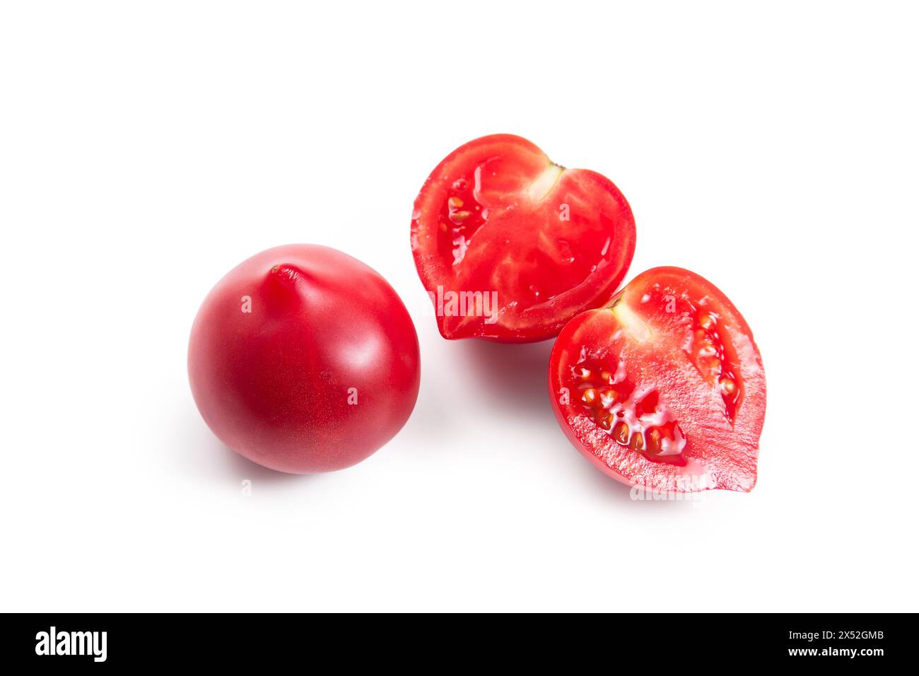 Whole and half of ripe juicy pink tomato with soft shadow isolated on ...