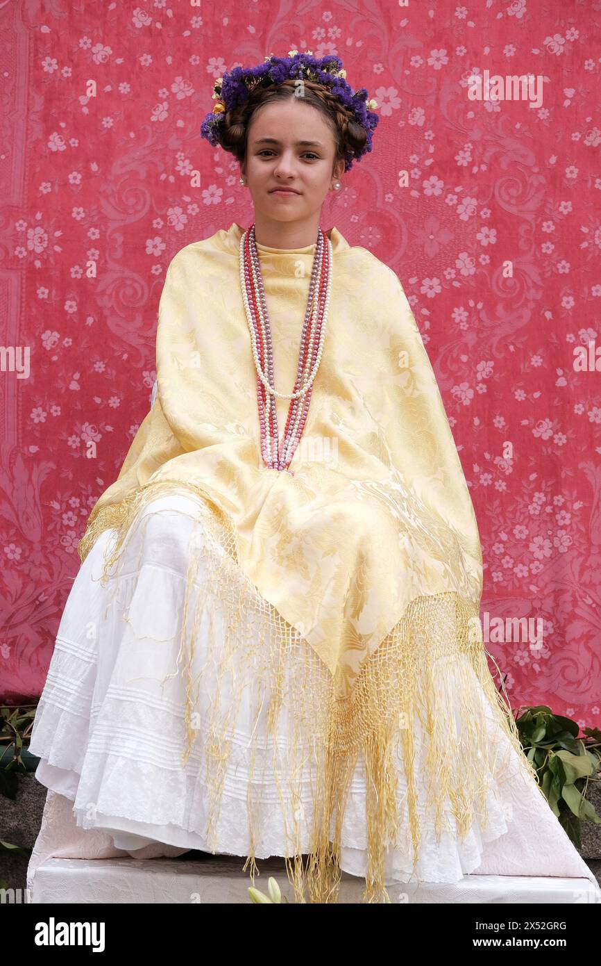 Celebration of "La Maya" refers to girls sitting on an altar adorned ...