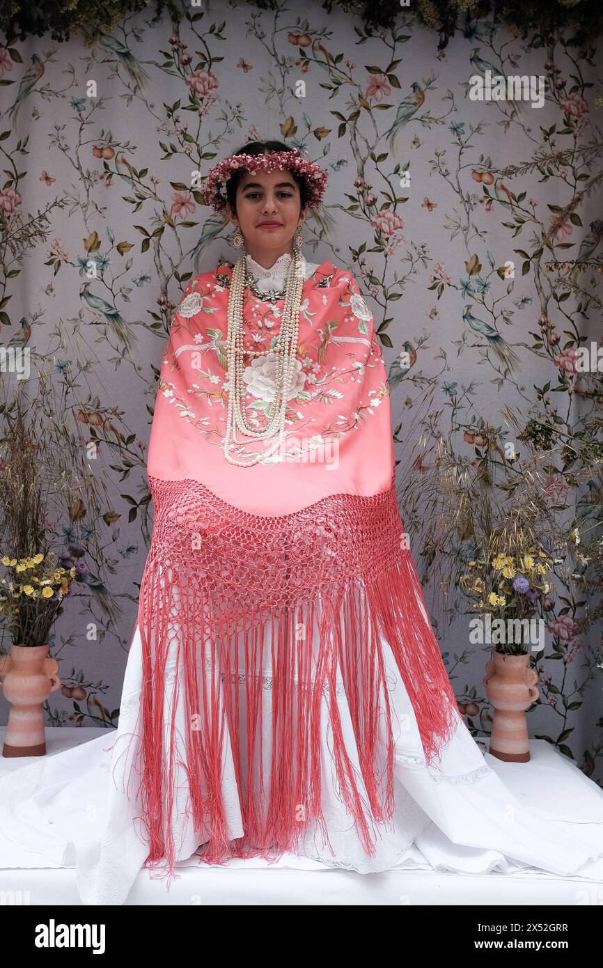 Celebration of "La Maya" refers to girls sitting on an altar adorned ...
