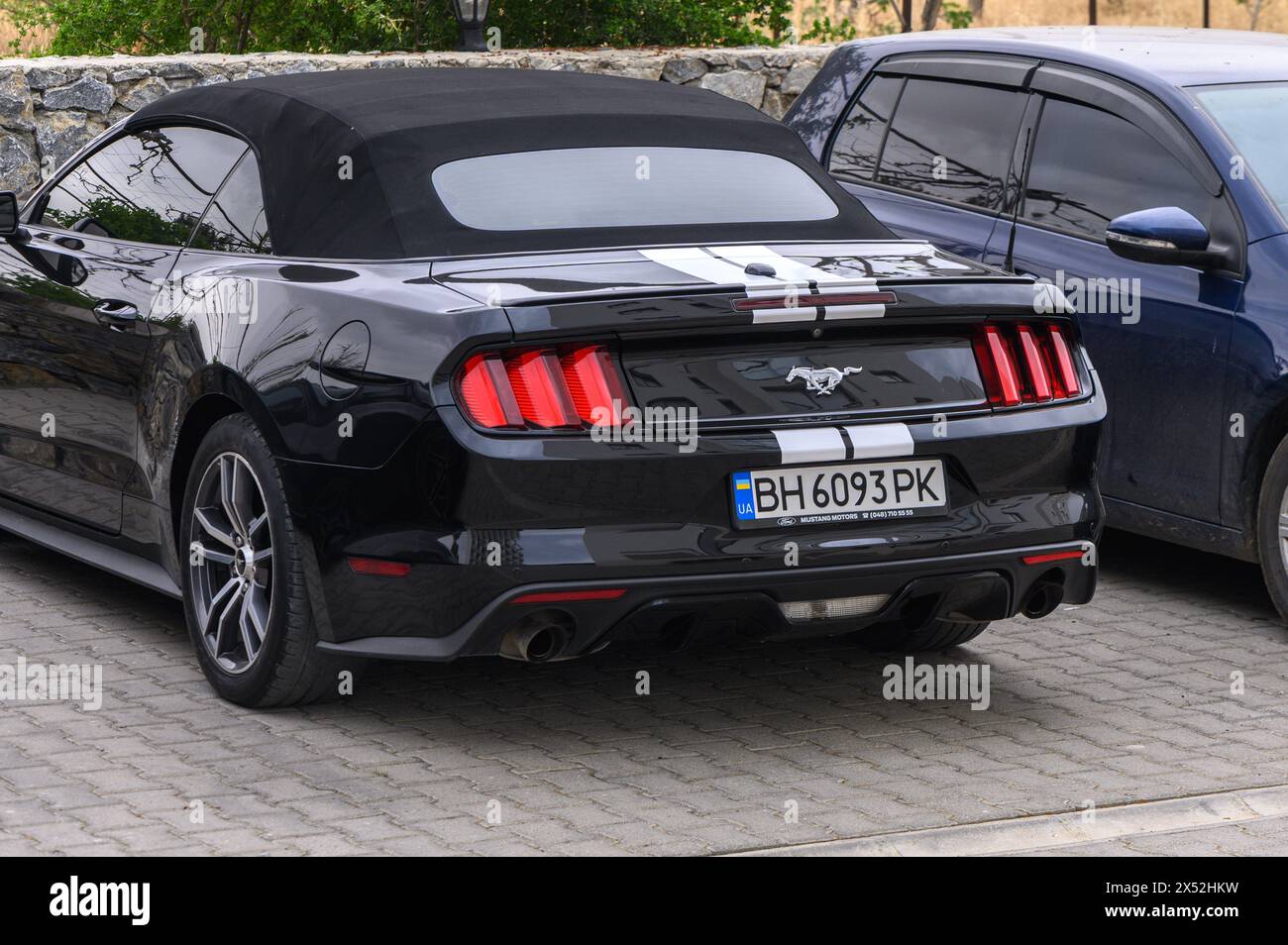 Gaziveren Cyprus 04.29.2024 black Ford Mustang Convertible rear view ...