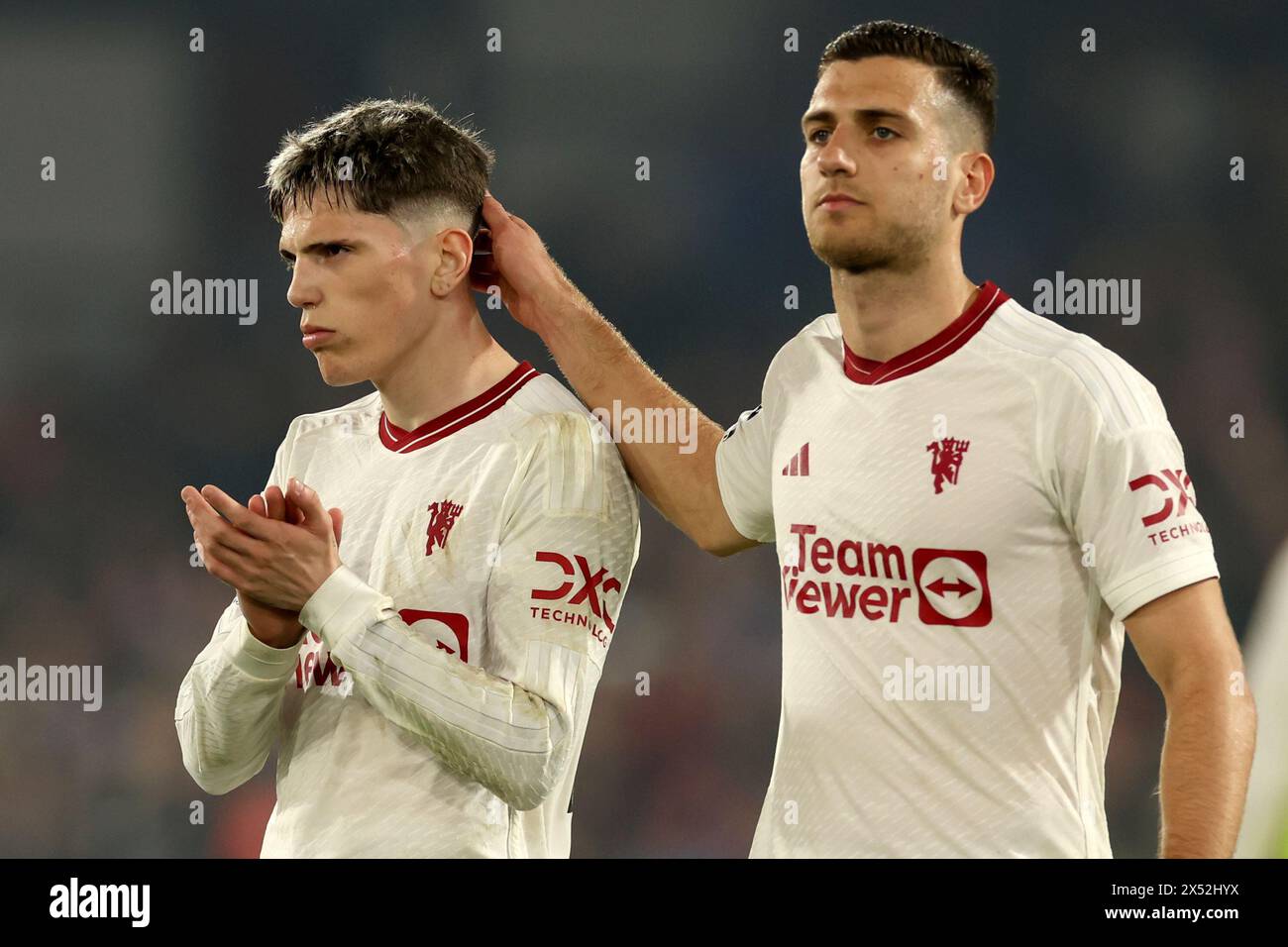 Manchester United's Alejandro Garnacho, left, Manchester United's Diogo ...