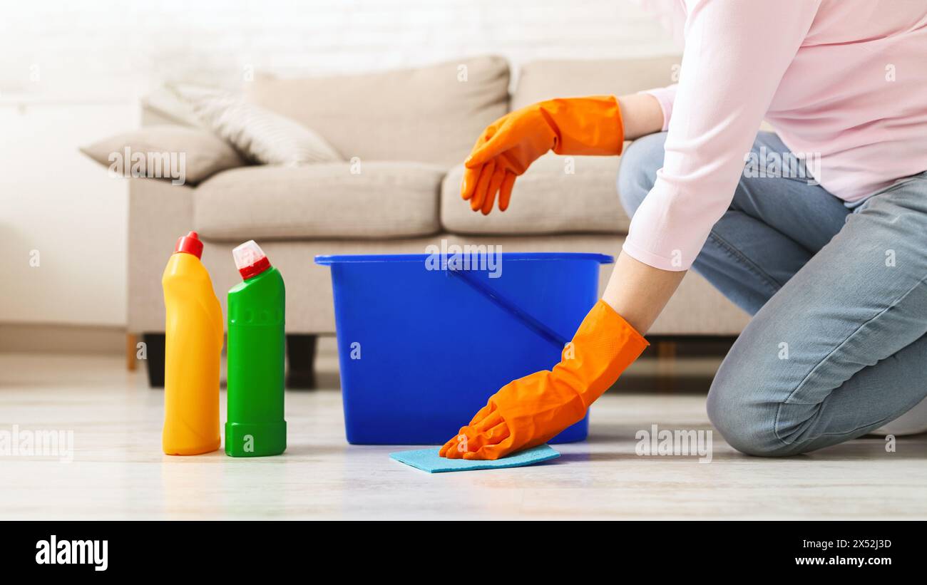 Woman with obsessive compulsive disorder cleaning floor Stock Photo - Alamy