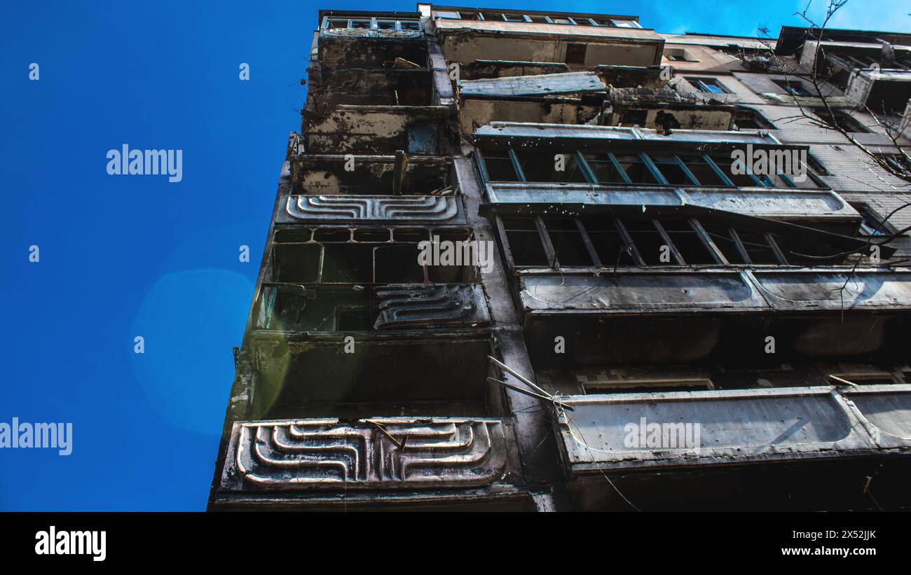 Close-up of the windows of the facade of a building that burned after ...