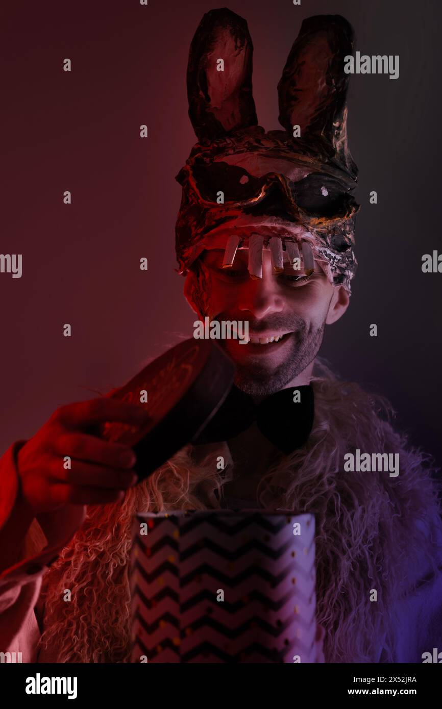 creepy man with smile, young guy in cringe in scary bunny mask, concept ...