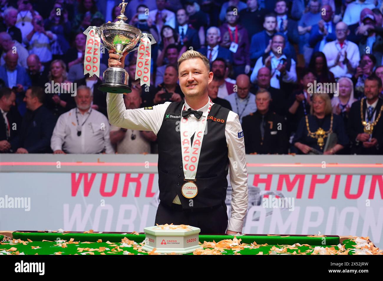 Kyren Wilson celebrates with the trophy after winning the final on day ...