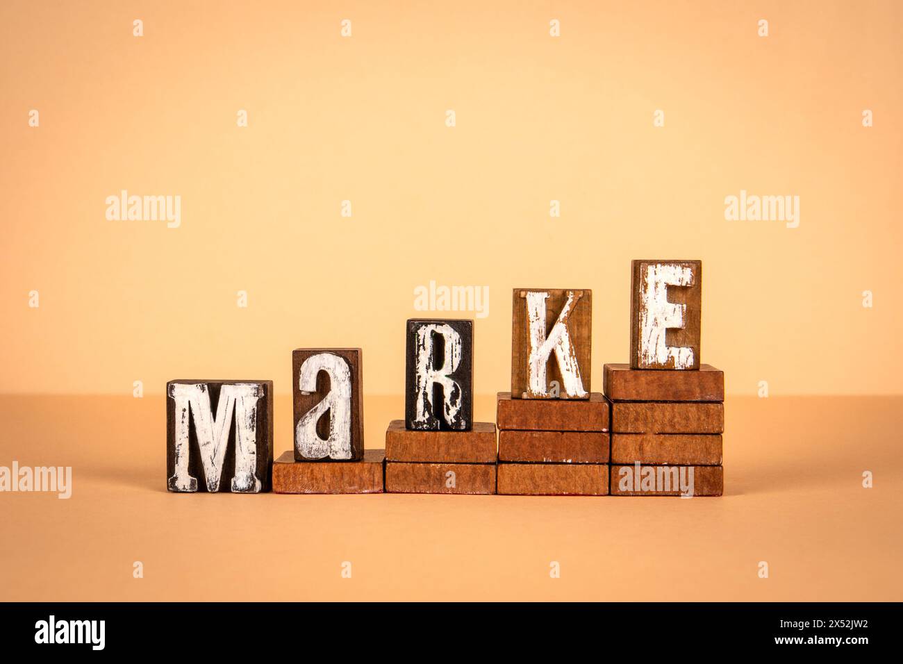 BRAND in German. Wooden alphabet letters on a light background Stock ...