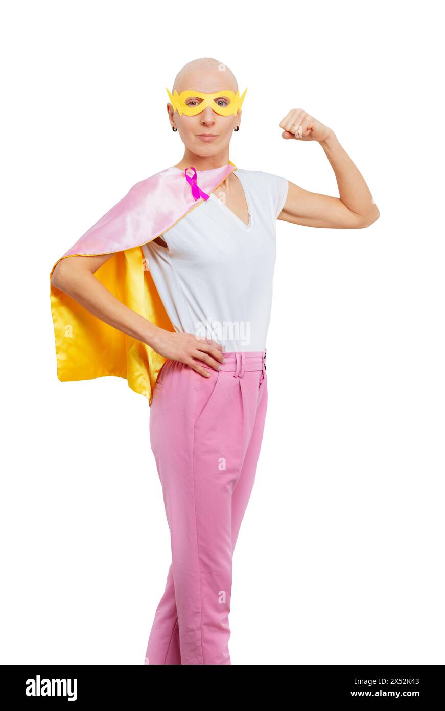 Woman ill of cancer strikes a strength pose in superhero costume Stock ...