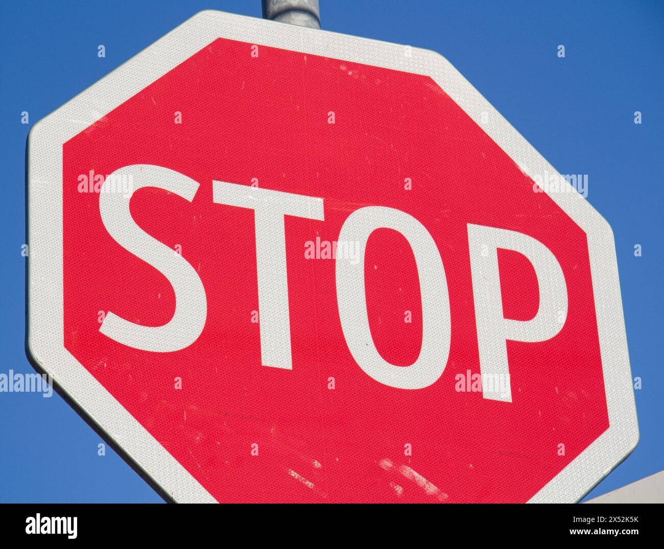 STOP traffic sign and universal symbol of warning Stock Photo - Alamy
