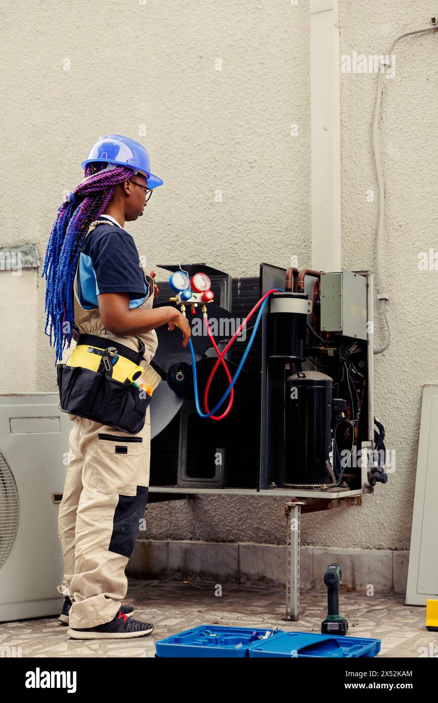 Trained serviceman for routine condenser maintenance, assembling set of ...