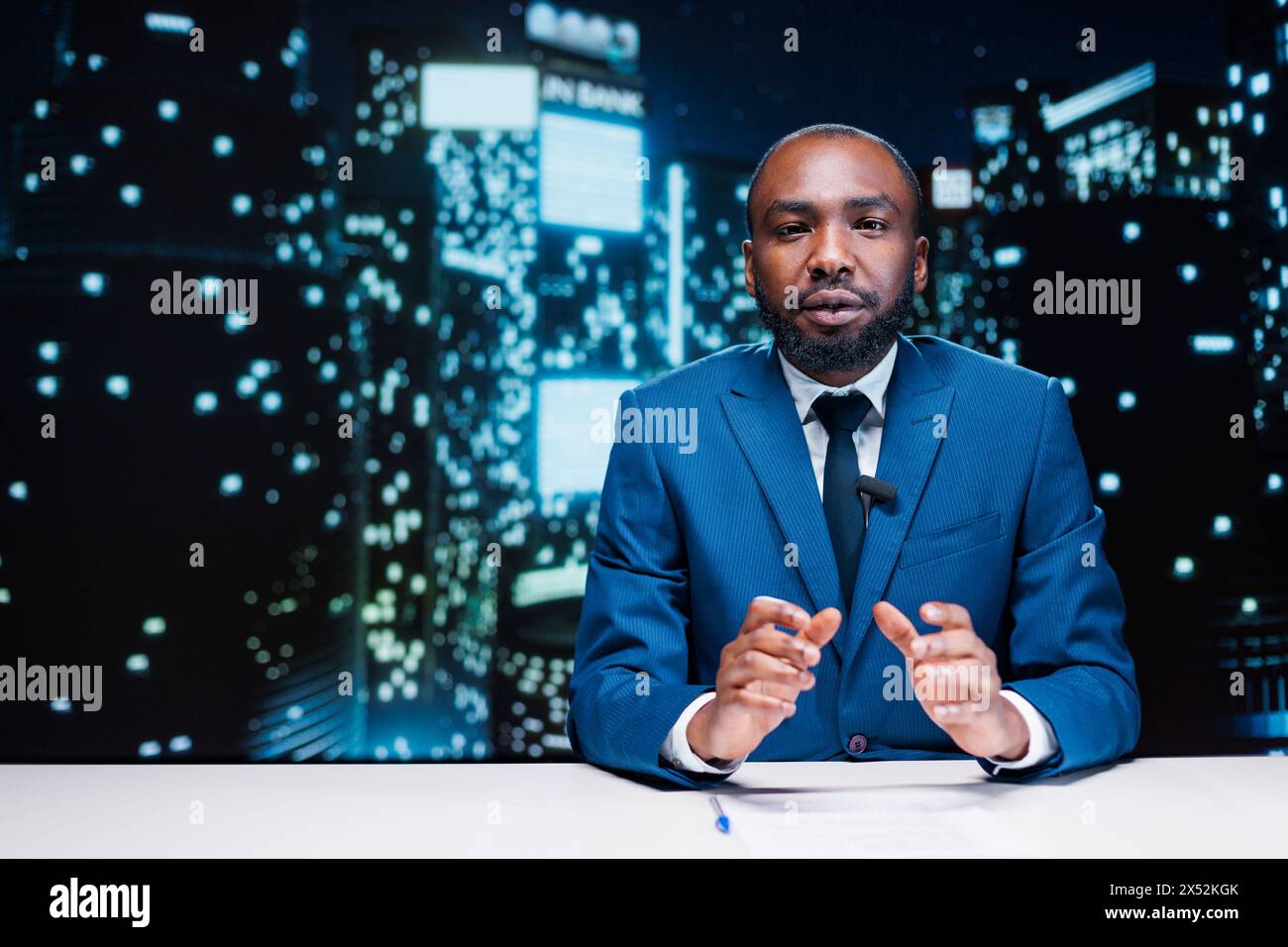 Anchorman working on live broadcast to discuss about latest events ...