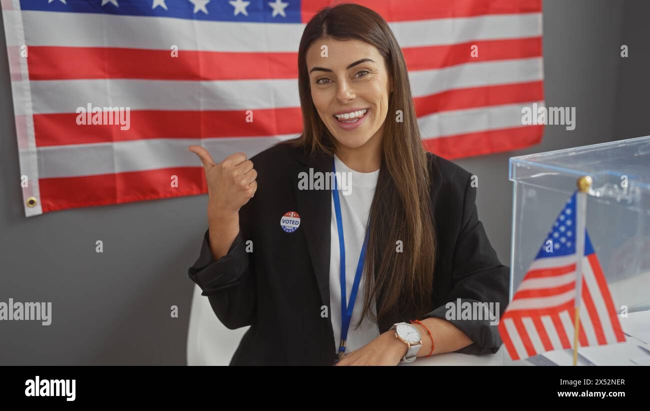 A young hispanic woman with an 'i voted' sticker, pointing to the ...