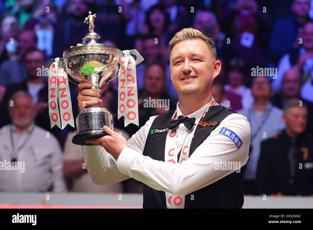 Kyren Wilson celebrates with the trophy after winning the final on day ...