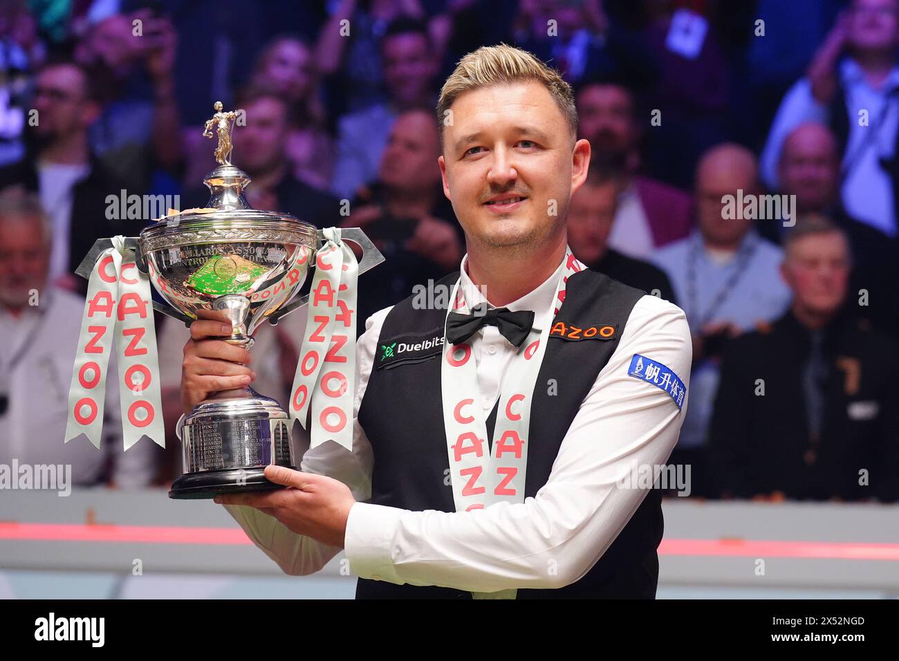 Kyren Wilson celebrates with the trophy after winning the final on day ...