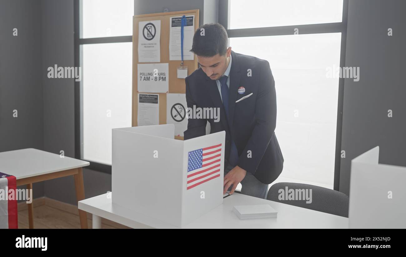Hispanic man voting in an american election, interior with us flag ...