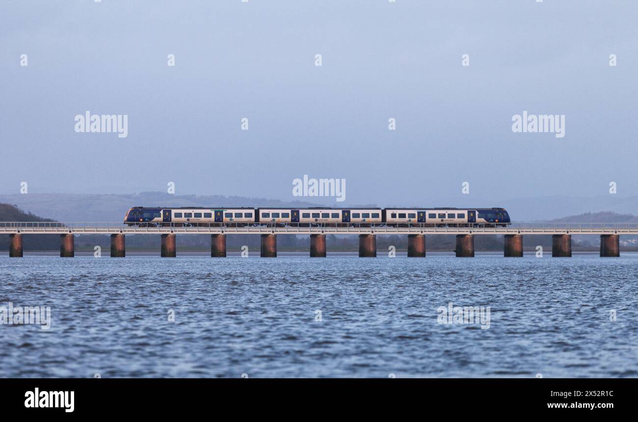 Northern rail class CAF 195 train crossing Arnside viaduct across the ...