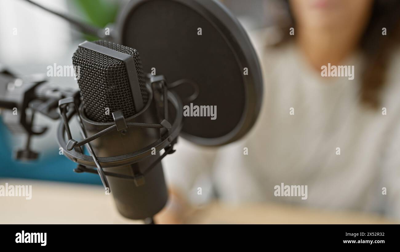 Content creator using microphone speak hi-res stock photography and ...