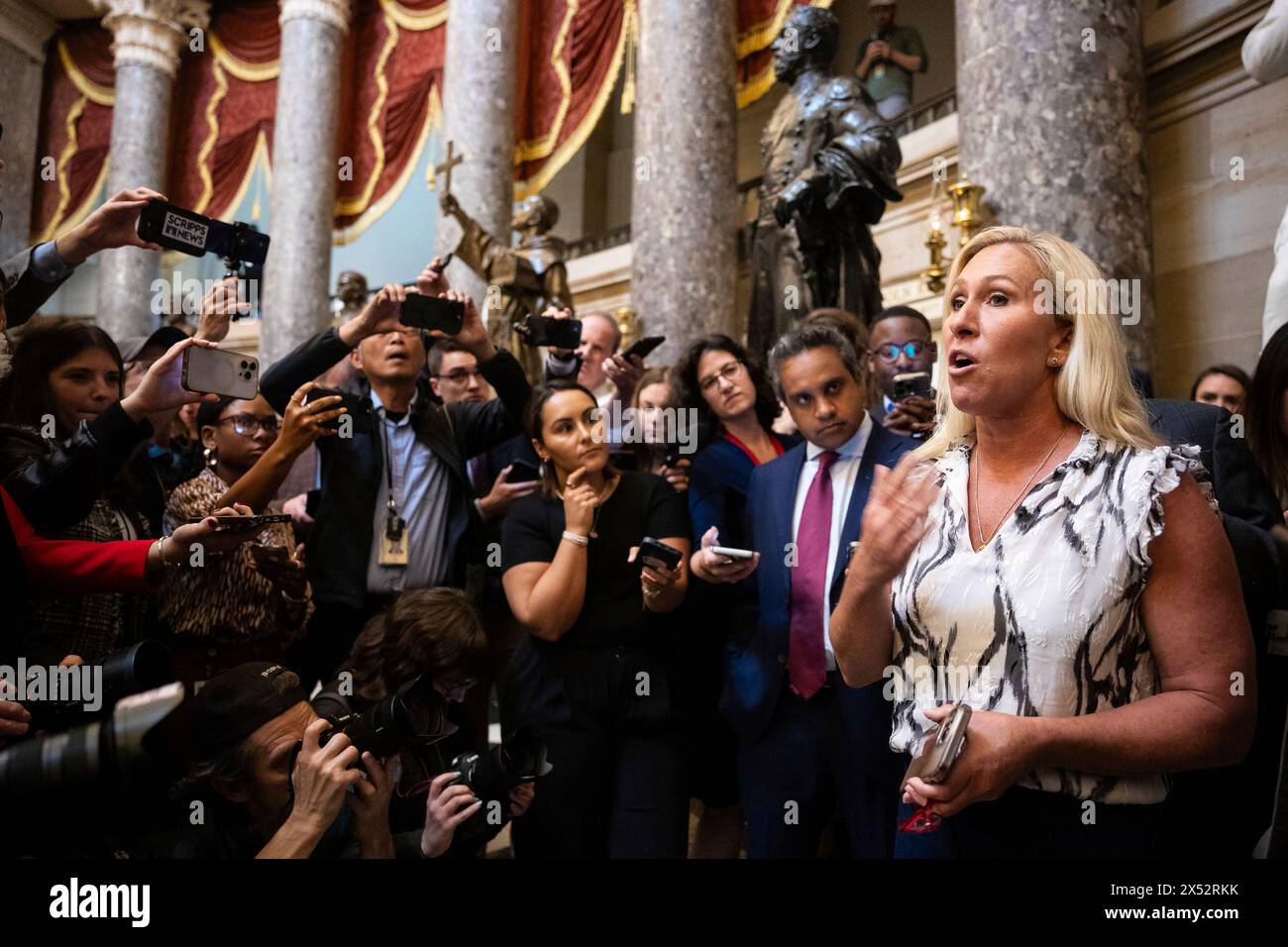 Rep. Marjorie Taylor Greene (R-Ga.) speaks with reporters after a ...