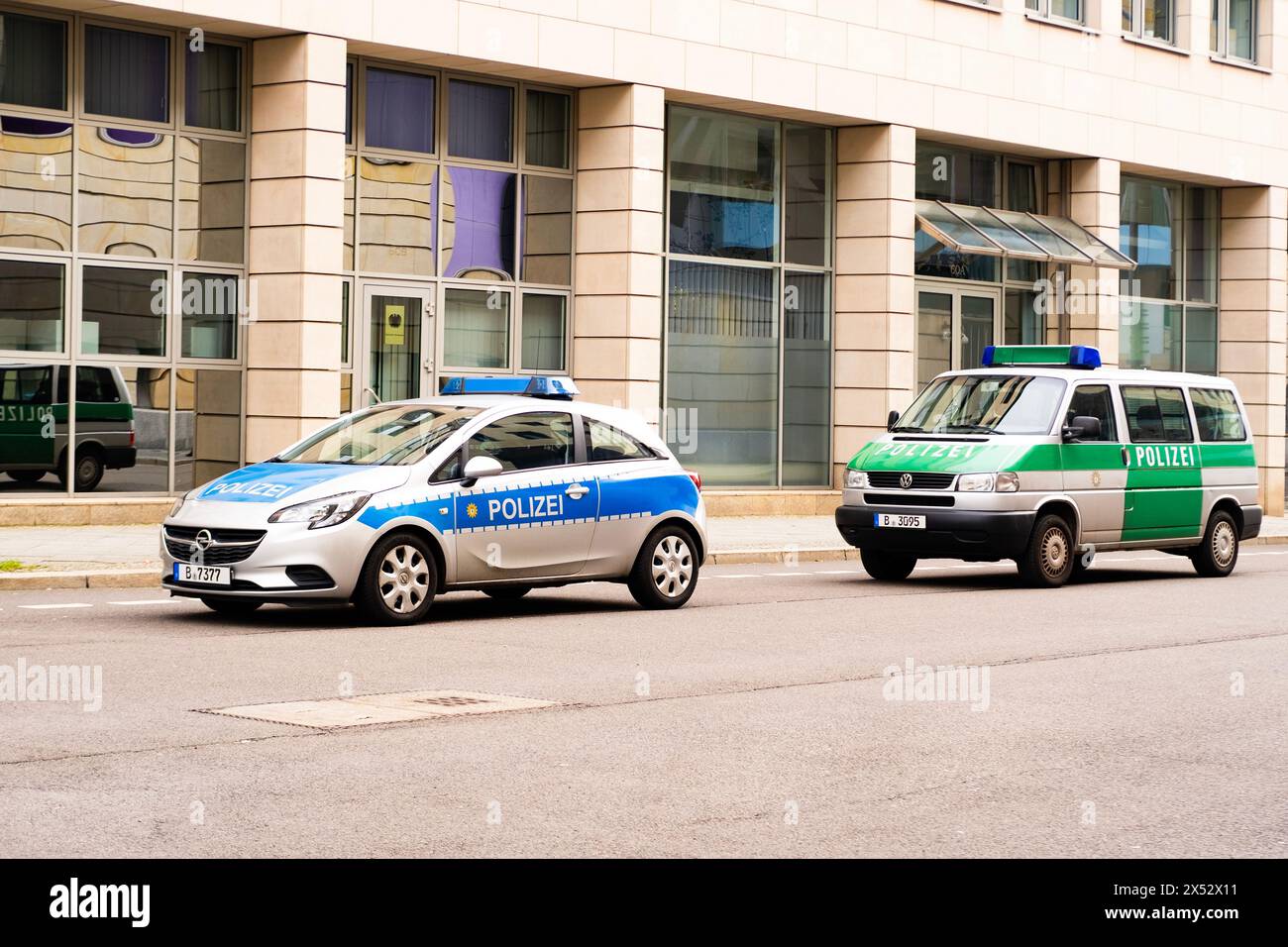 police cars parked on street in Berlin near British Consulate, symbol ...