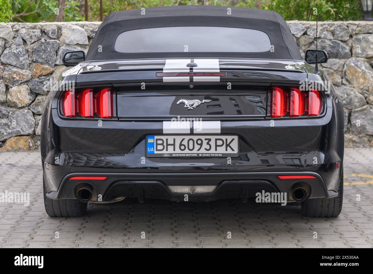 Gaziveren Cyprus 04.29.2024 black Ford Mustang Convertible rear view 6 ...