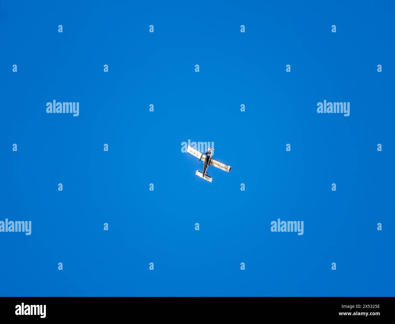 Small ultralight airplane with overhead wing and single propeller ...