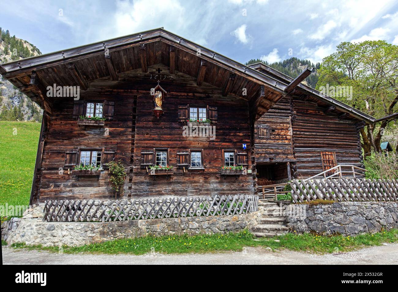 Old farmhouse, now a museum, in the historic mountain farming village ...