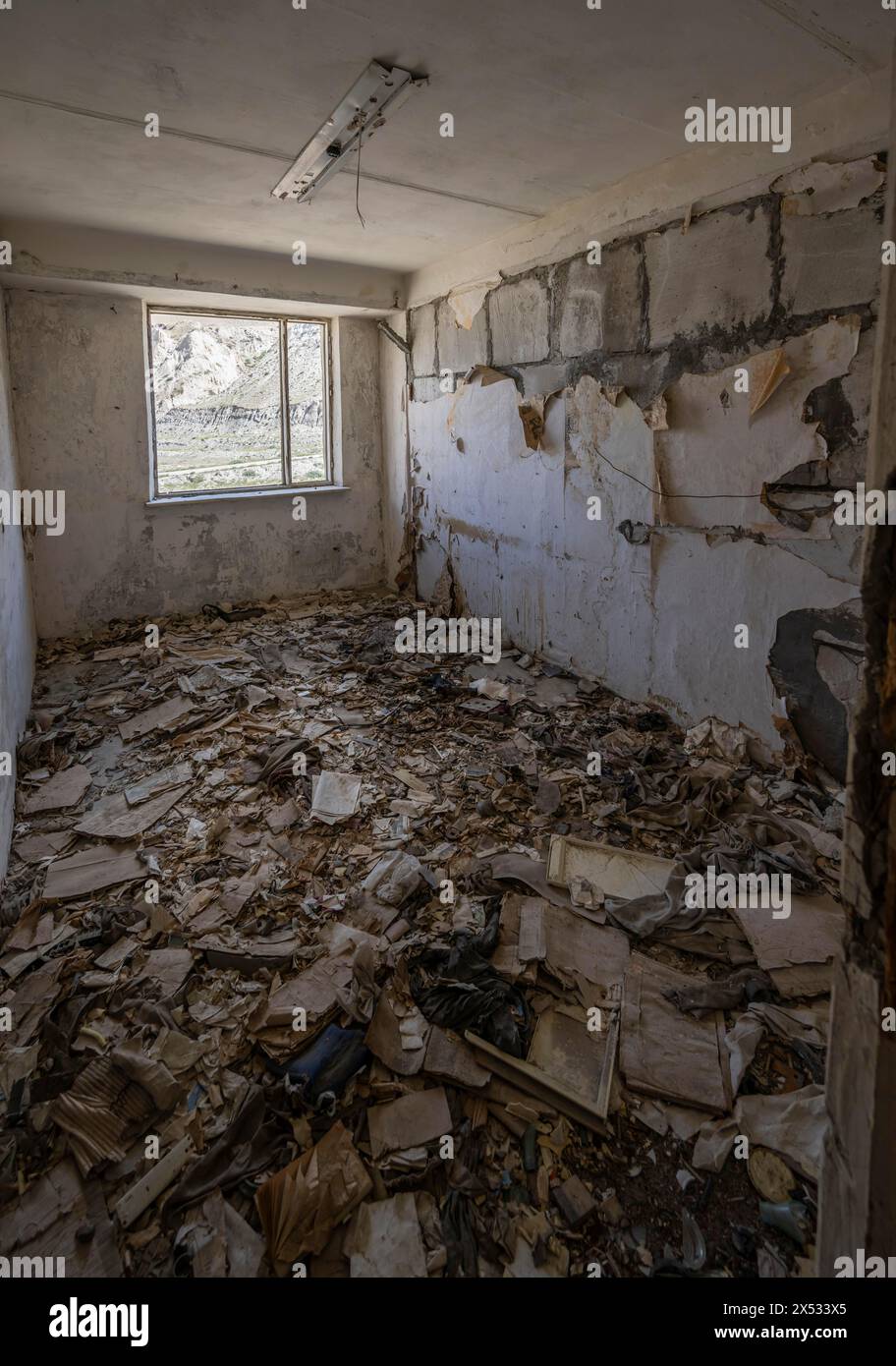Abandoned destroyed room full of rubble, ghost town, Engilchek, Tian ...