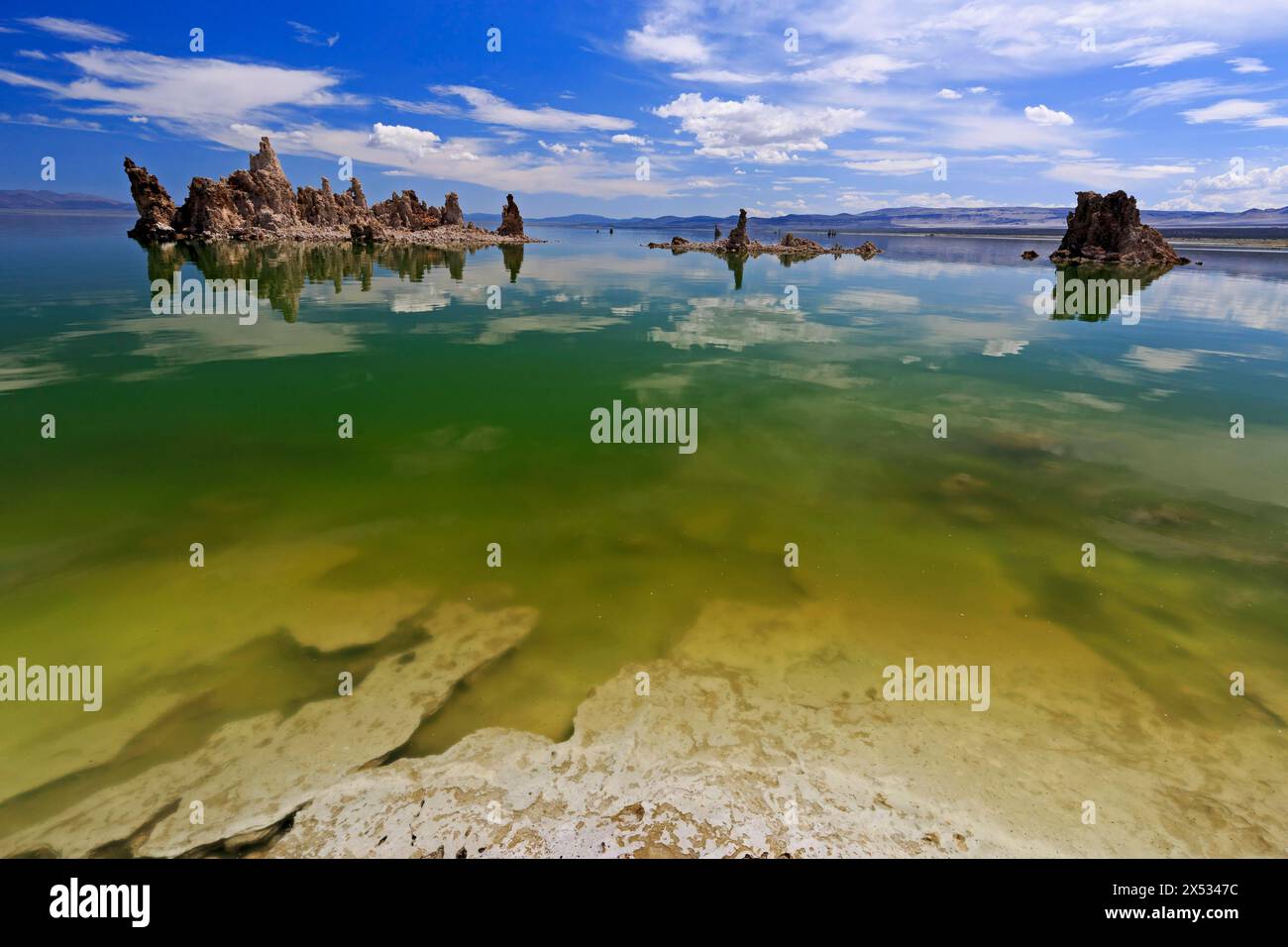Expansive view of tufa towers in Mono Lake under an expansive blue sky ...