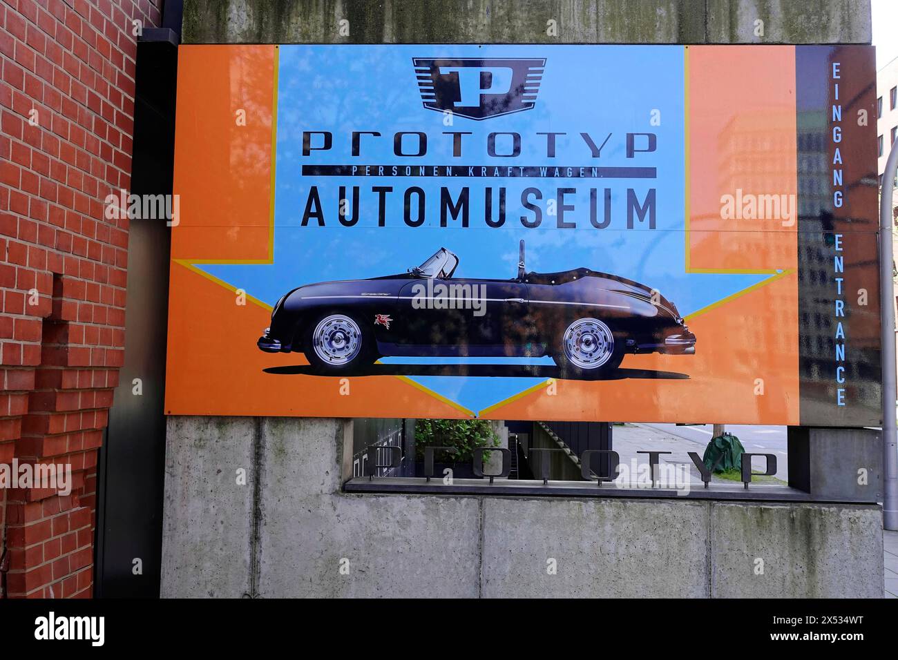 An advertising banner for the prototype car museum with an image of a ...