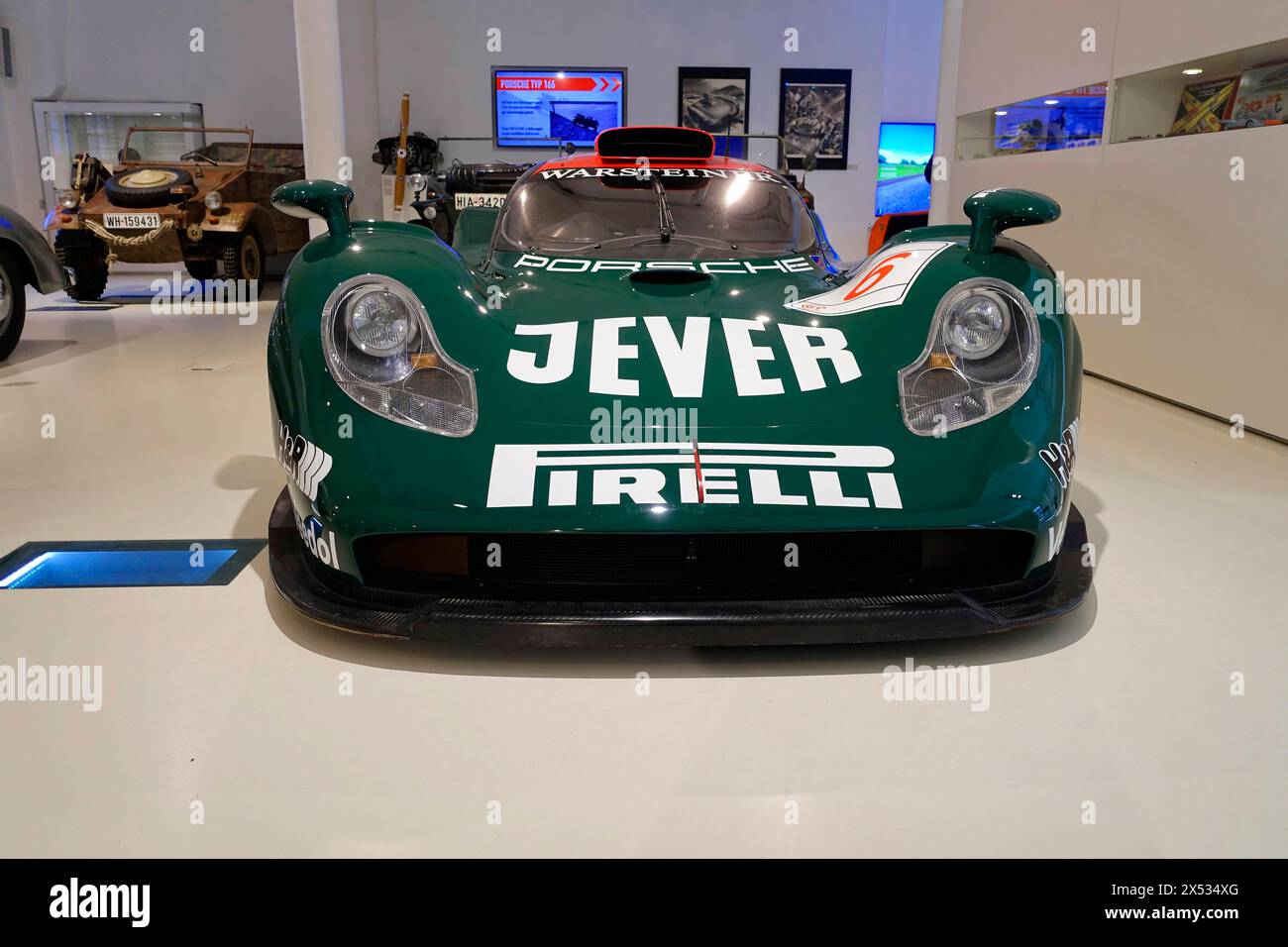 PORSCHE 911 GTI 98, A green Porsche racing car with Jever and Pirelli ...